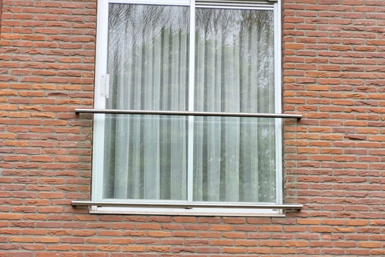 Franse balkons met glas in Twello